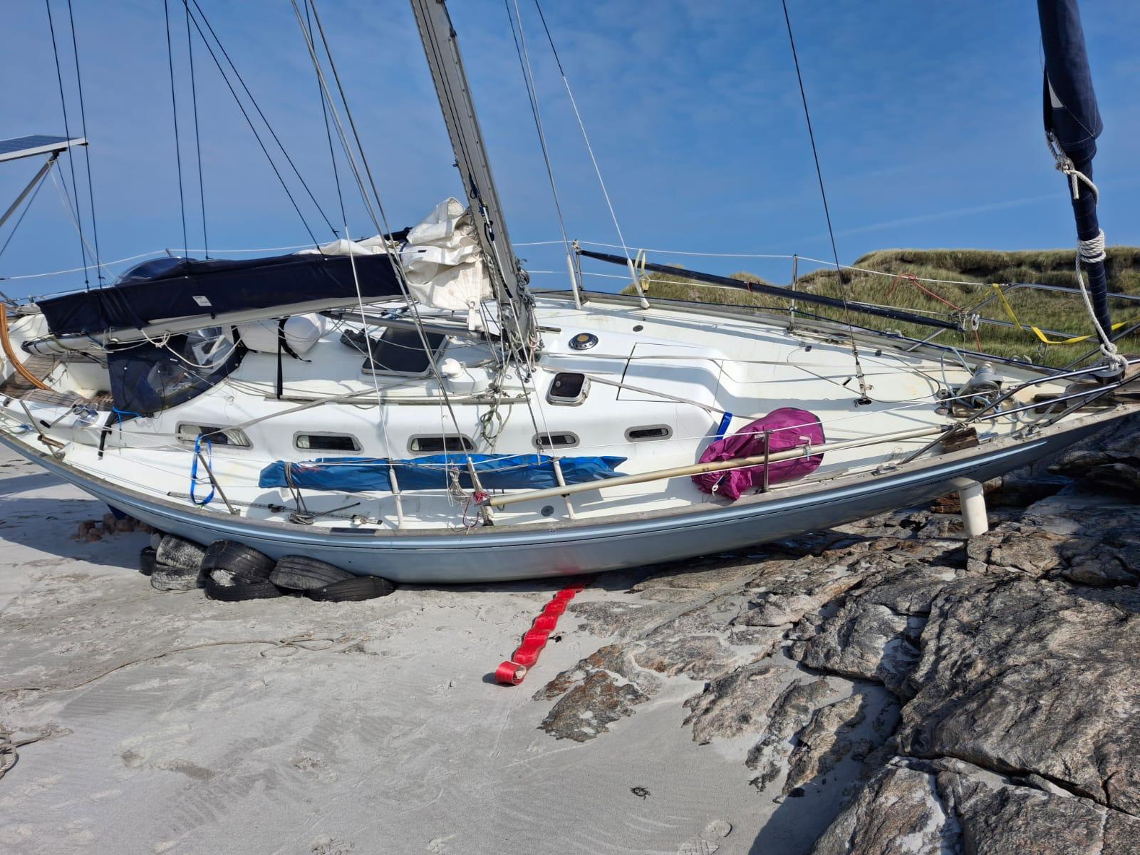 Lone Sailor Narrowly Escapes Disaster as Storm Smashes Boat Onto Rocks ...
